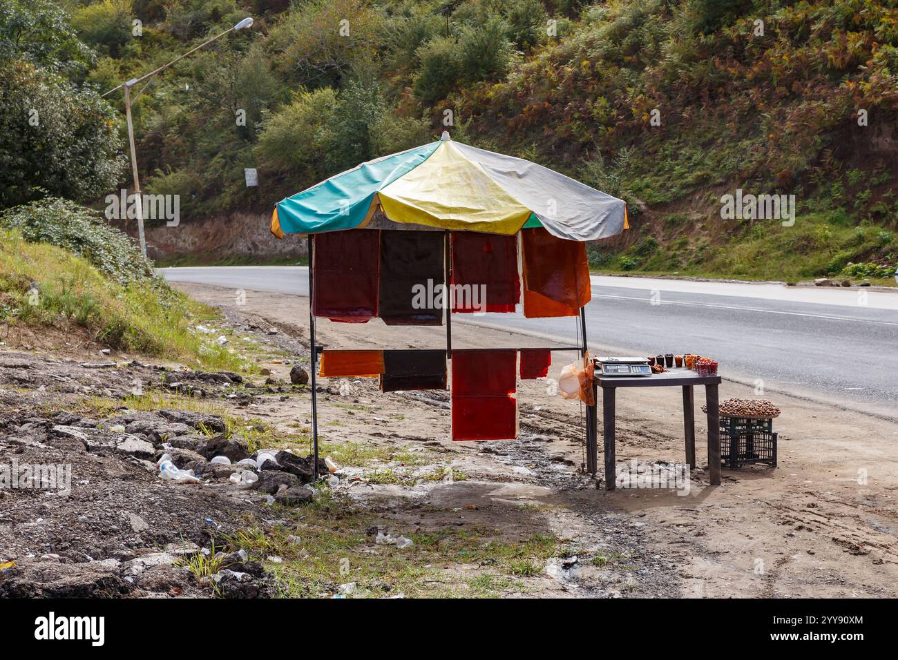 A colorful roadside stand in Iran serves traditional pastila, set ...