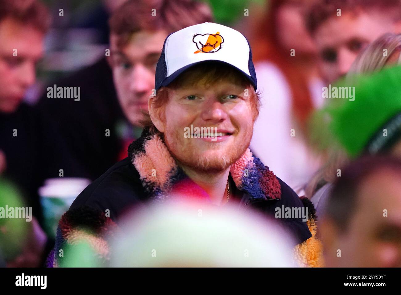 Singer songwriter Ed Sheeran watches the action during day six of the ...