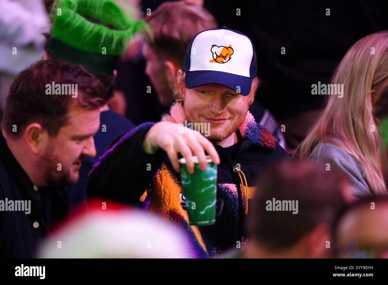 Singer songwriter Ed Sheeran watches the action during day six of the ...
