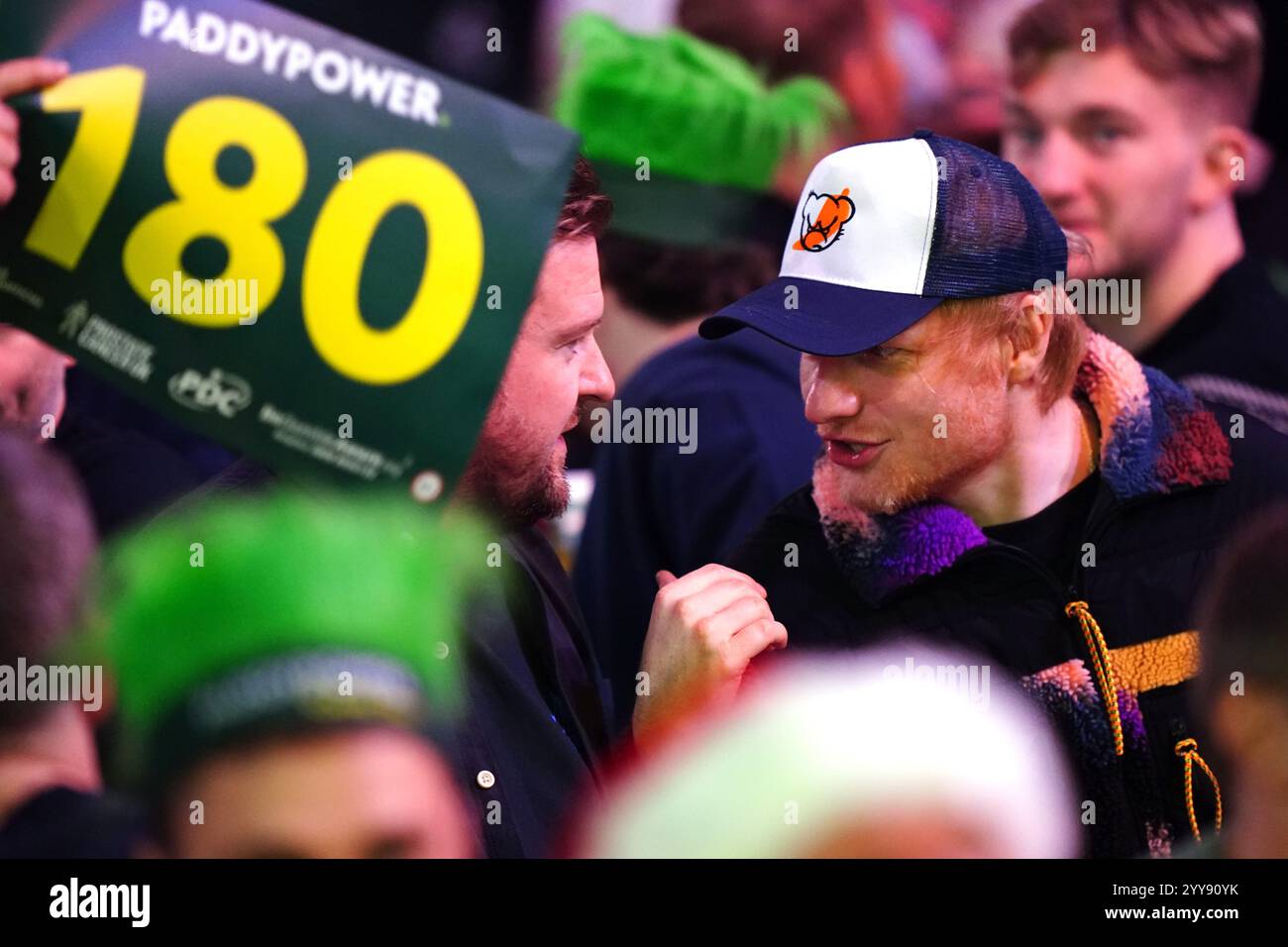 Singer songwriter Ed Sheeran watches the action during day six of the ...