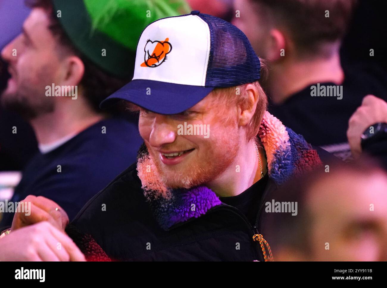 Singer songwriter Ed Sheeran watches the action during day six of the ...