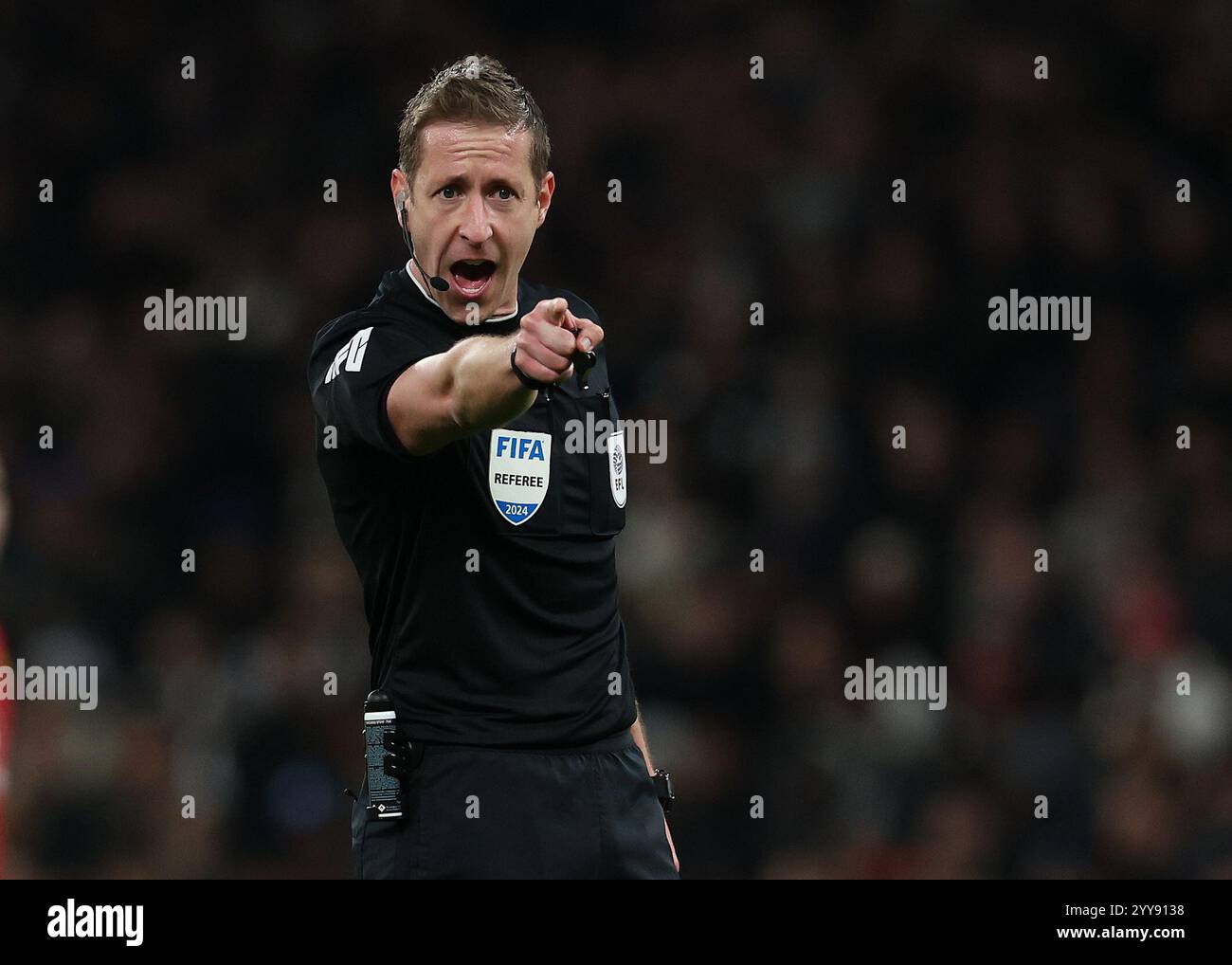 London, UK. 19th Dec, 2024. Referee John Brooks during the Carabao Cup ...
