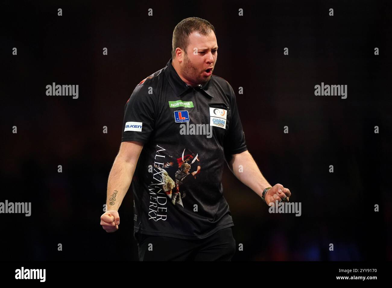 Alexander Merkx celebrates a point against Stephen Burton (not pictured ...