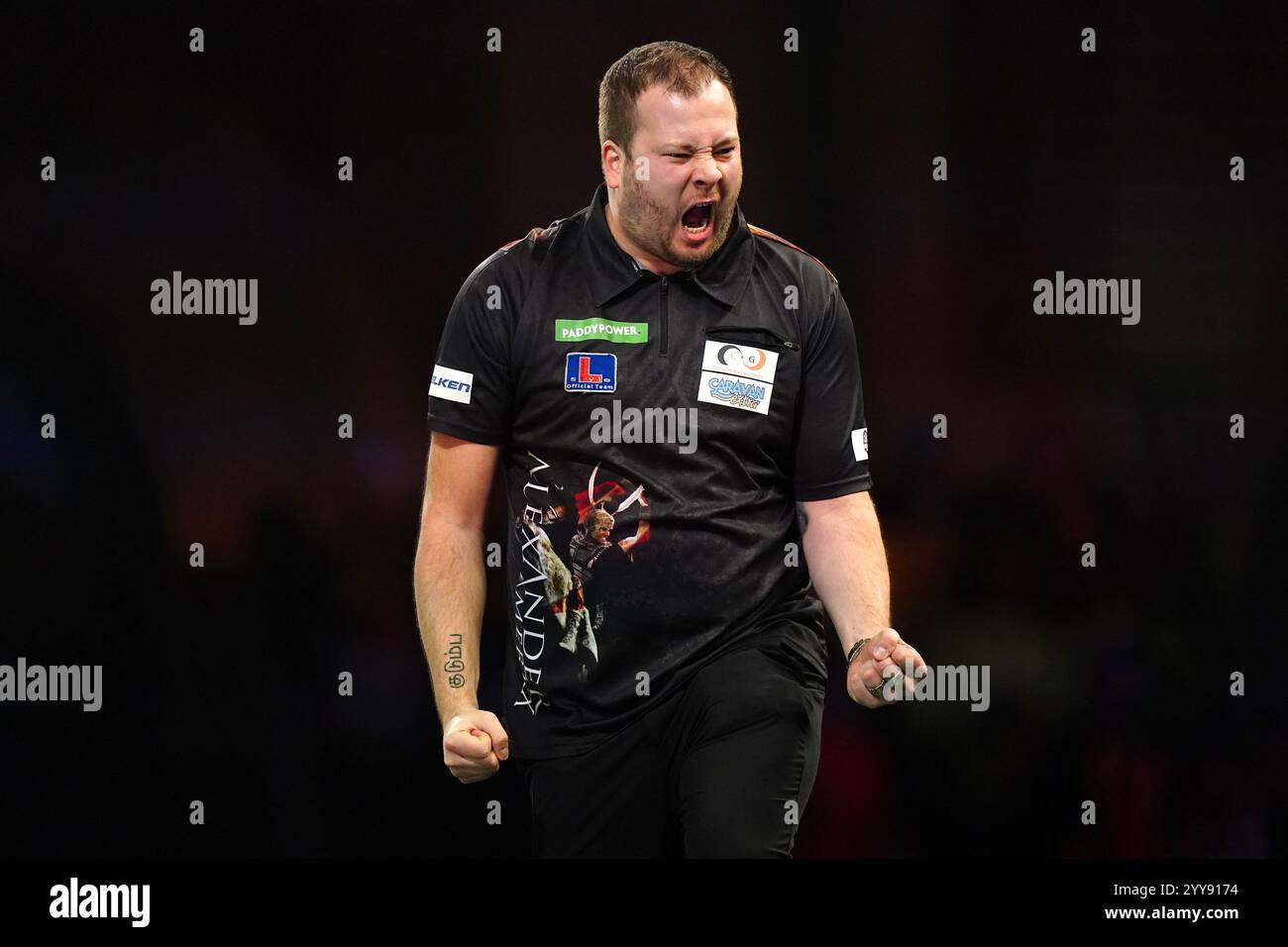 Alexander Merkx celebrates a point against Stephen Burton (not pictured ...