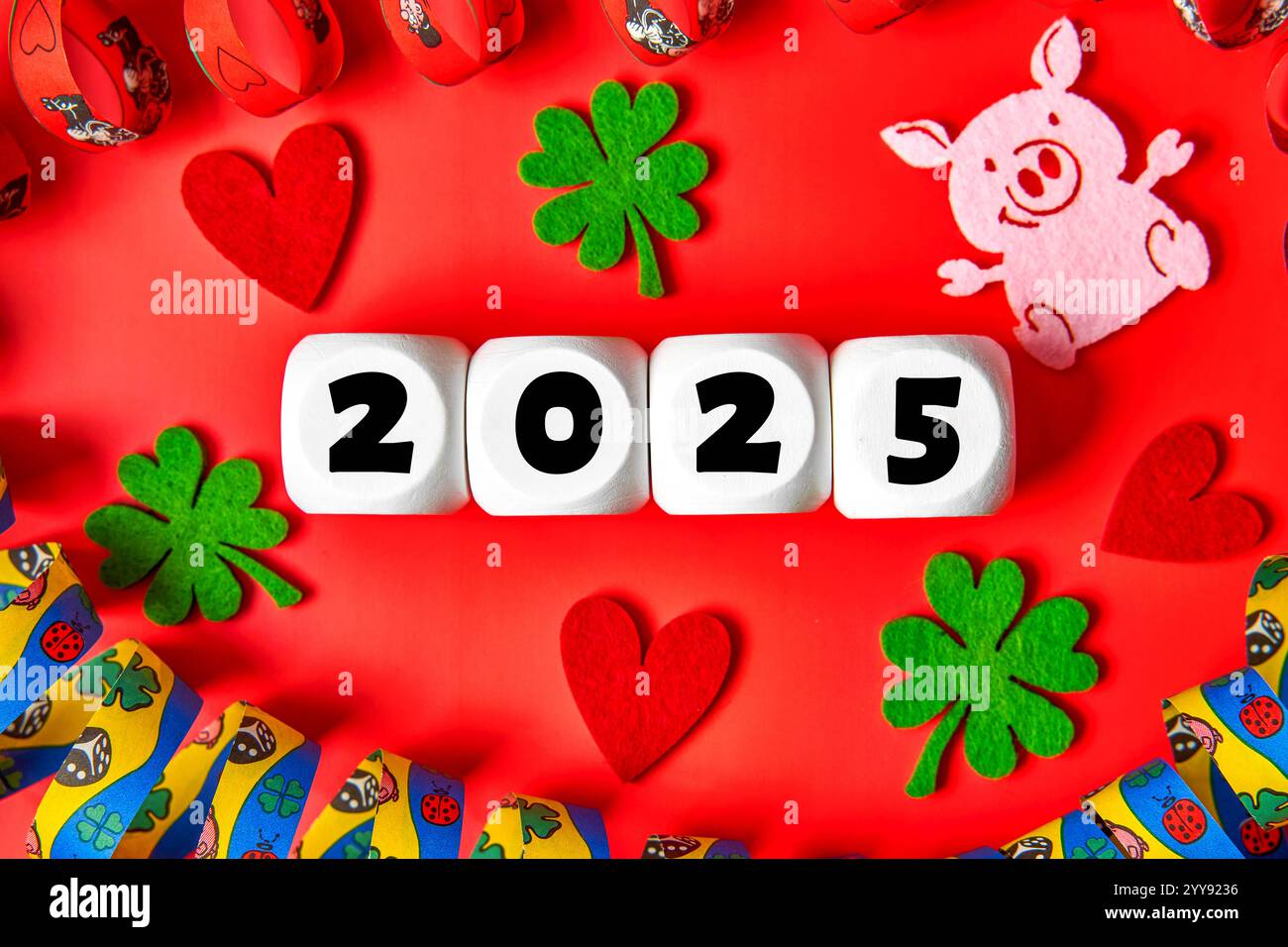 19 December 2024: Cube with the year 2025 Lucky charm with shamrocks ...
