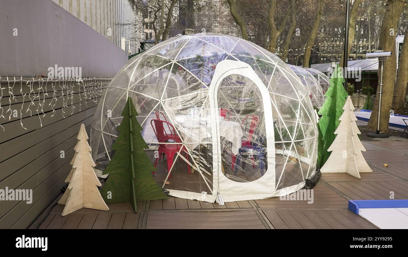 NEW YORK, NY, USA - DECEMBER 13, 2024: A transparent igloo is placed in ...