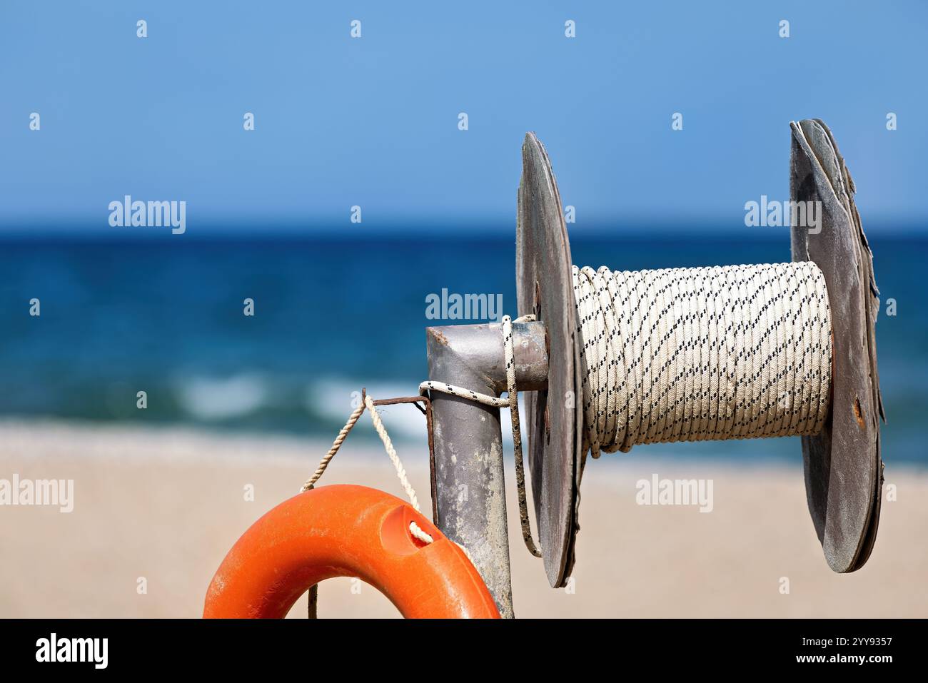 Lifebuoy with throwing device on the beach of Crete, Greece Stock Photo ...