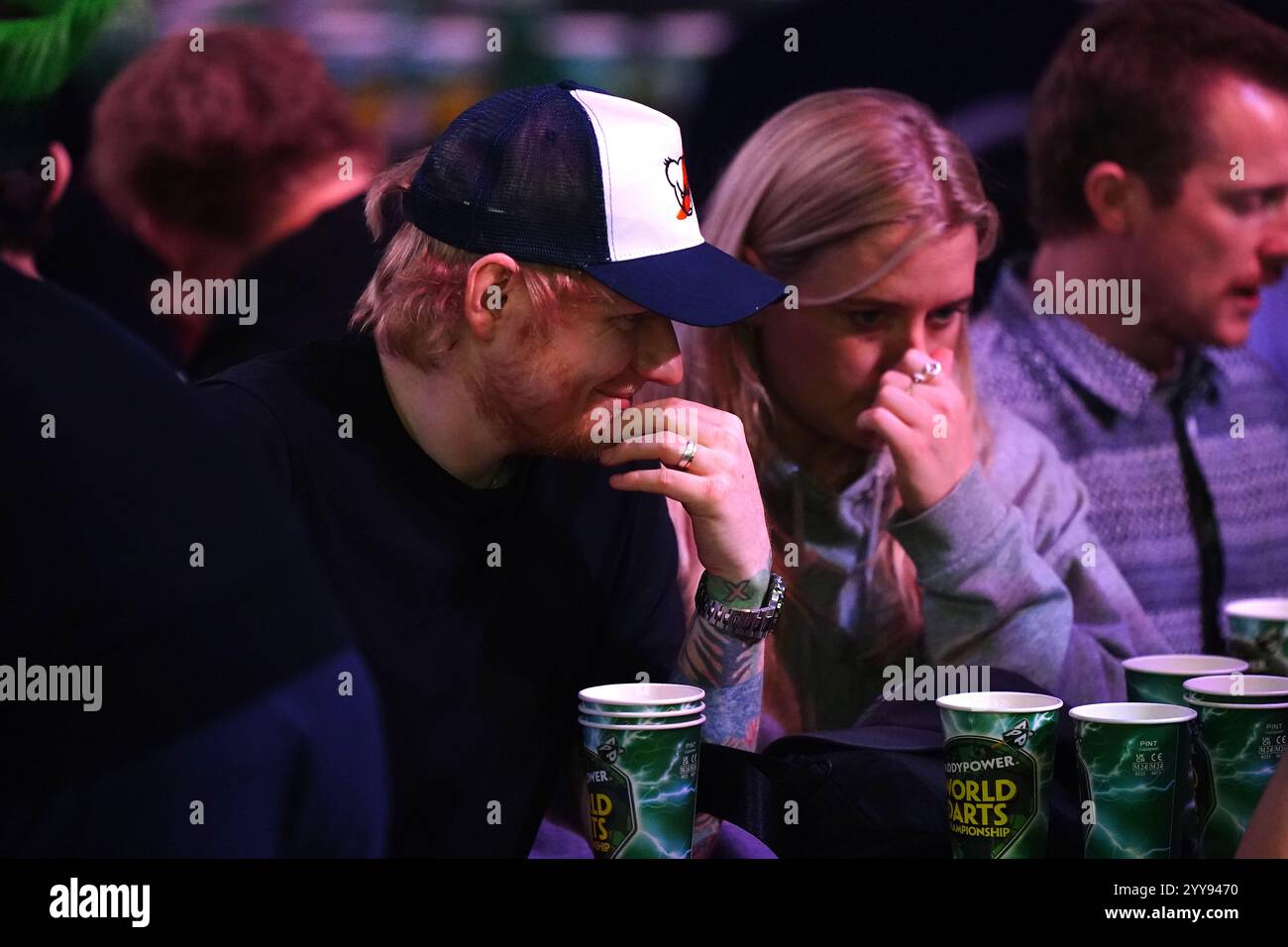 Singer songwriter Ed Sheeran watches the action during day six of the ...