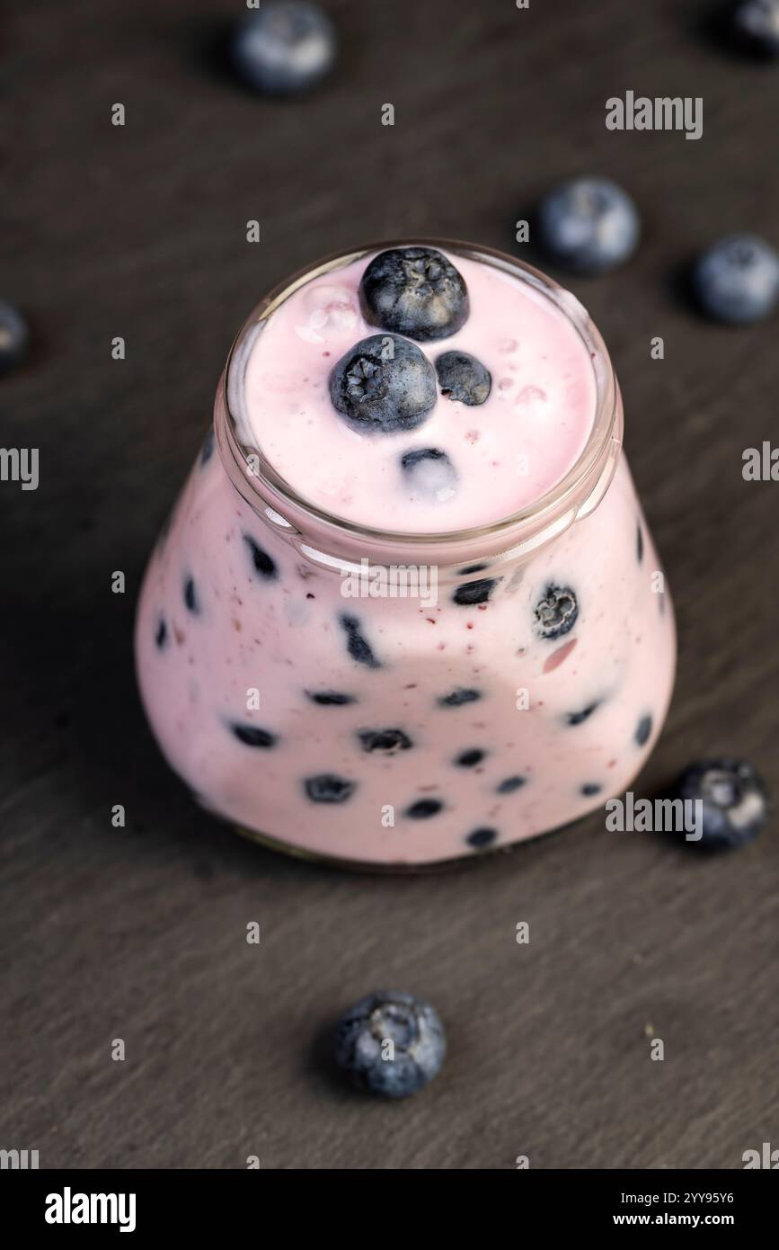 blueberry and berry-flavored yogurt, blueberry yogurt with slices and ...