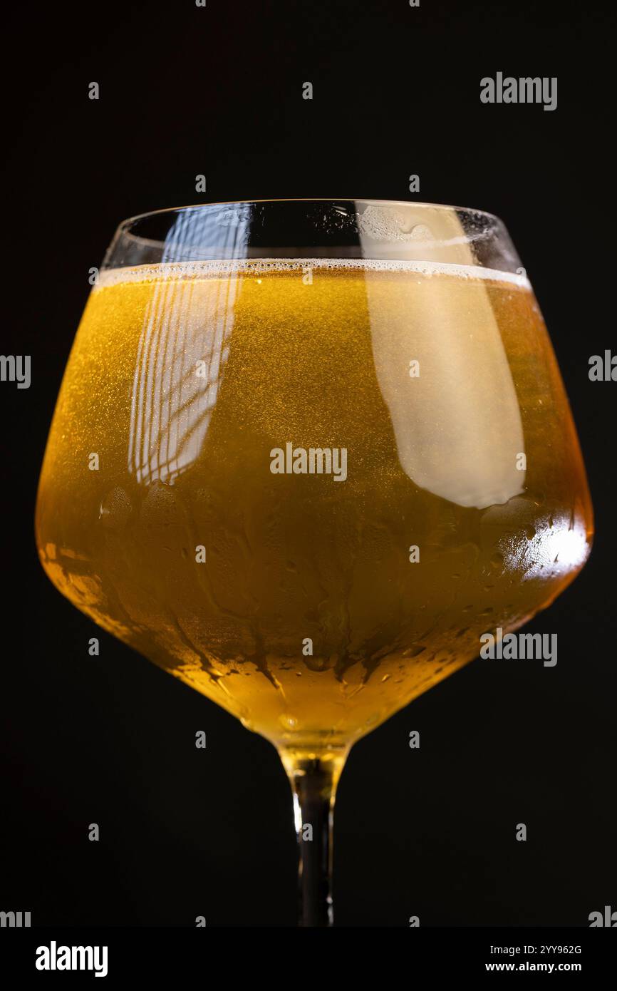 bubbles of apple juice with grape juice, cold apple juice drink in a ...