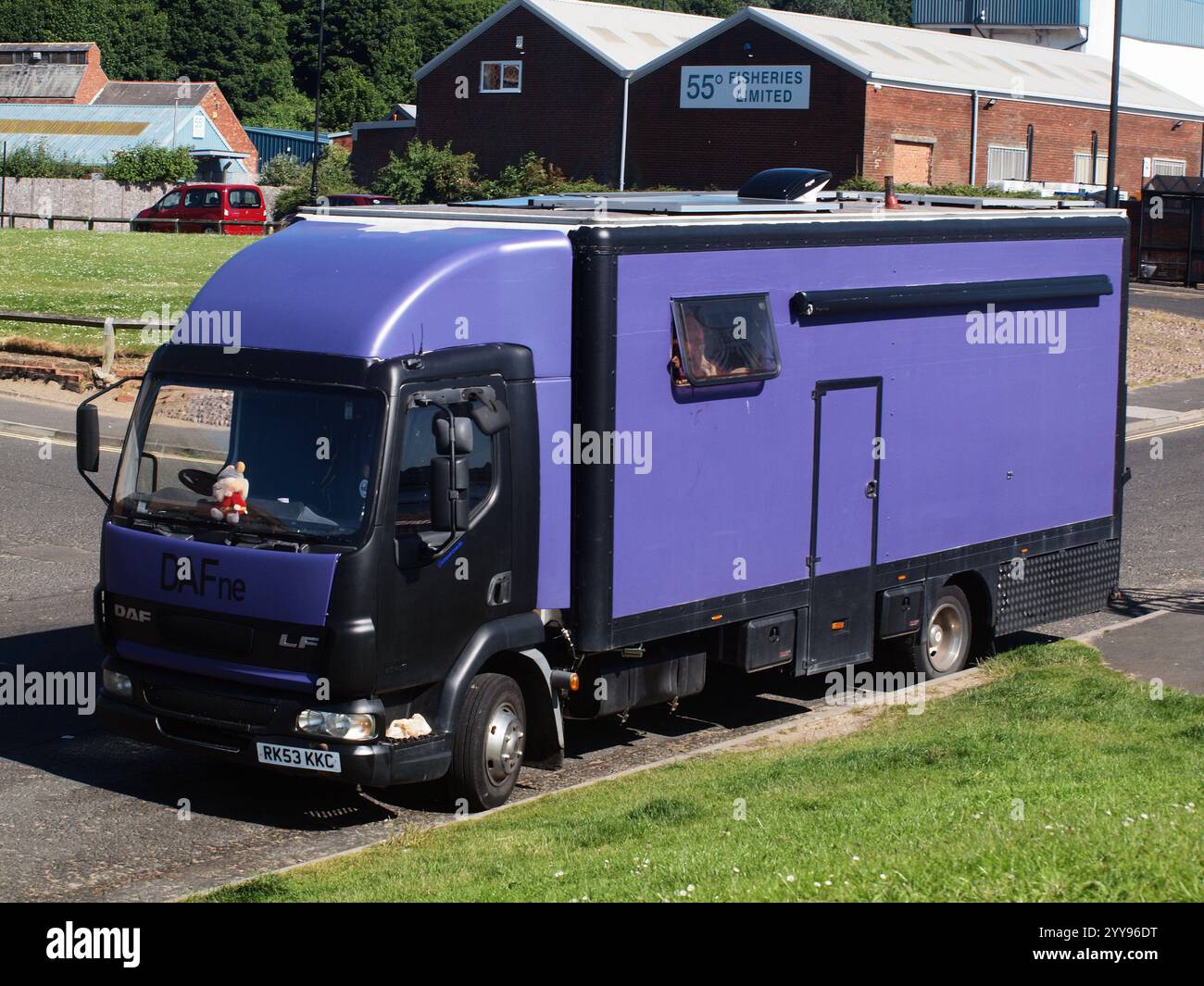 People living an alternative lifestyle in a box truck lorry van ...