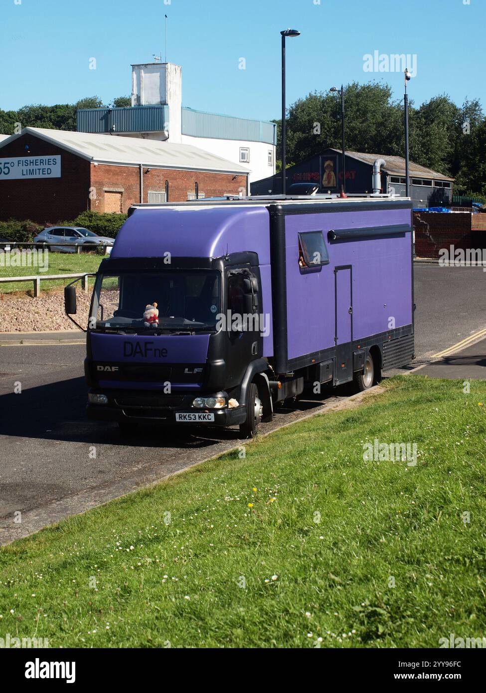 People living an alternative lifestyle in a box truck lorry van ...