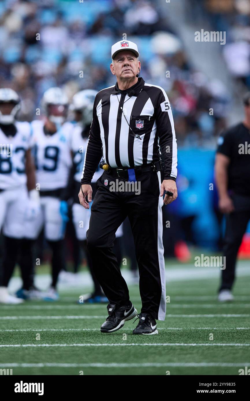 Referee Bill Vinovich (52) looks up at the video board during an NFL ...