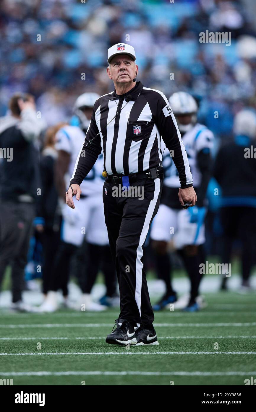 Referee Bill Vinovich (52) looks up at the video board during an NFL ...