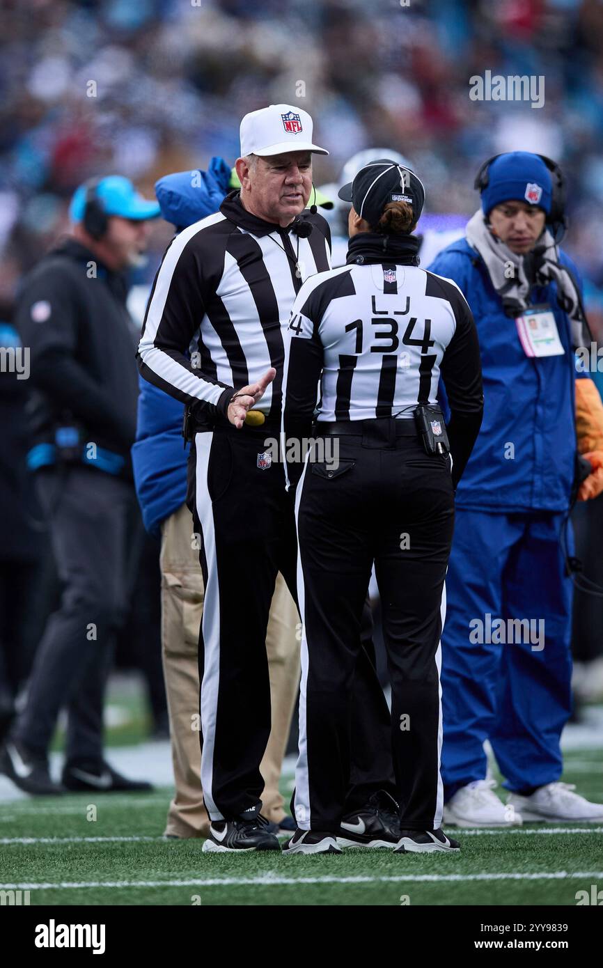 Referee Bill Vinovich (52) had a conversation with line judge Robin ...
