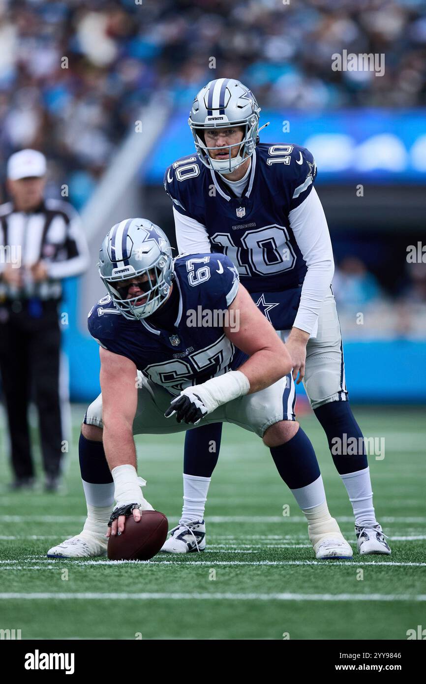 Dallas Cowboys quarterback Cooper Rush (10) lines up under center Brock ...