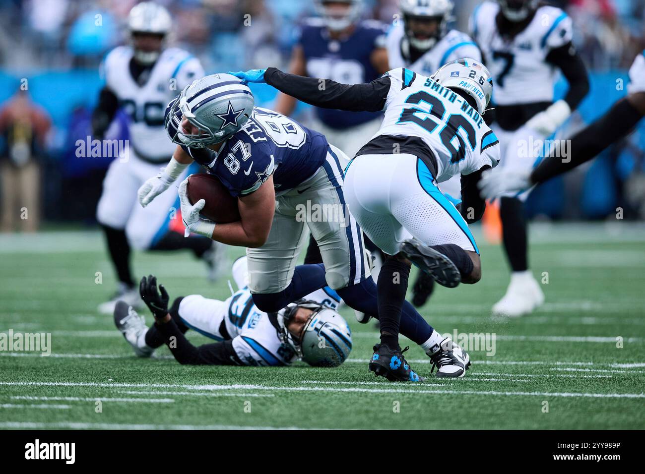 Dallas Cowboys tight end Jake Ferguson (87) avoids the tackle attempt ...
