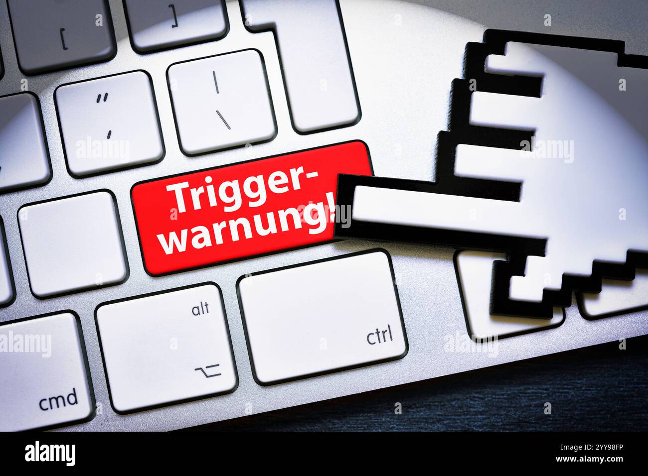 FOTOMONTAGE, Computertaste mit der Aufschrift Triggerwarnung *** PHOTOMONTAGE, computer button ...