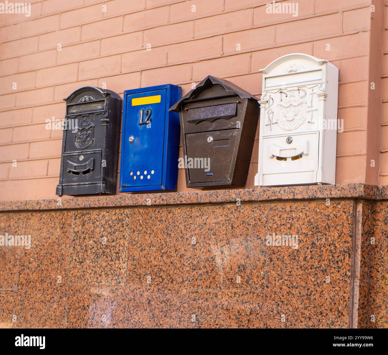 Colorful Mailboxes on a Wall. Mail box for letters on the street Stock ...