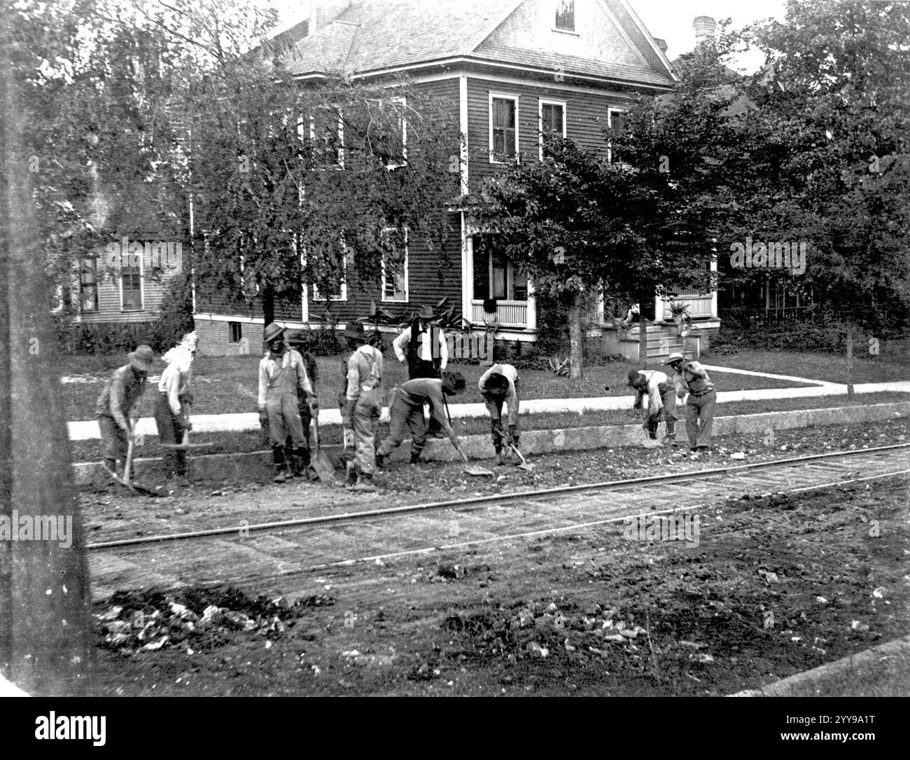 This undated photo shows city convicts working alongside railroad ...