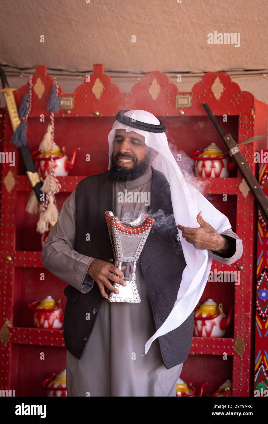Al-Sayahid, KSA, 14th December 2024: saudi man burning bakhoor Stock ...