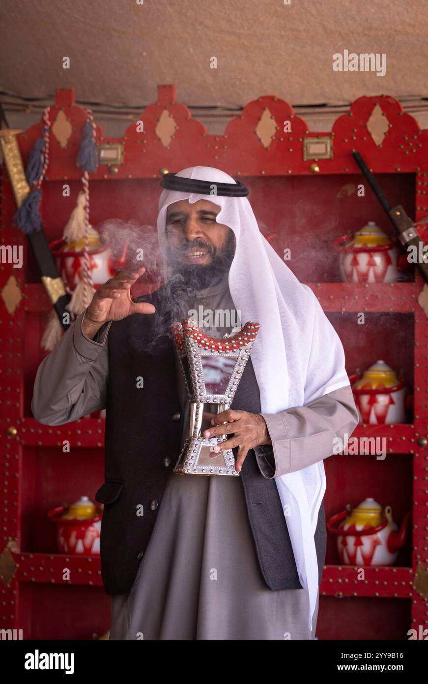 Al-Sayahid, KSA, 14th December 2024: saudi man burning bakhoor Stock ...