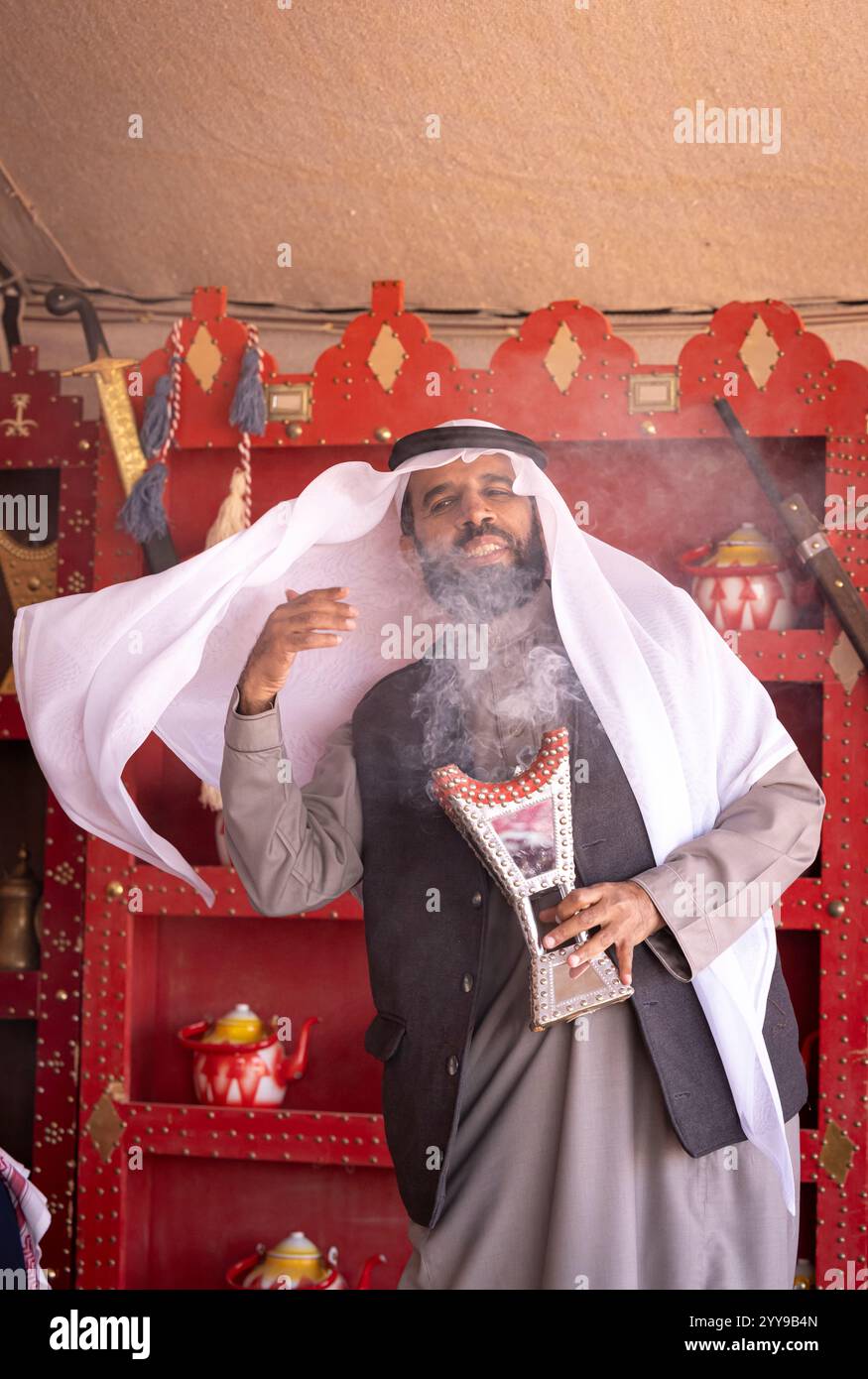 Al-Sayahid, KSA, 14th December 2024: saudi man burning bakhoor Stock ...