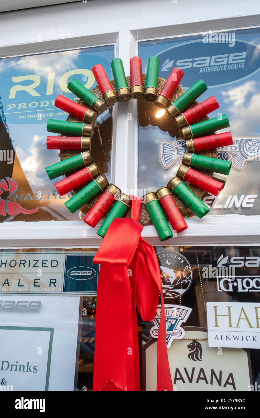 Quirky Christmas wreath made of shotgun cartridges hanging on the door ...