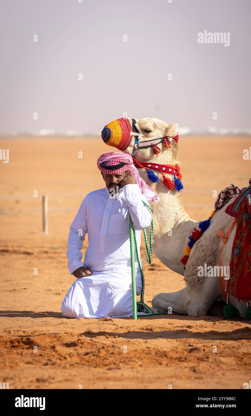 Al-Sayahid, KSA, 14th December 2024: camel rider in traditional ...