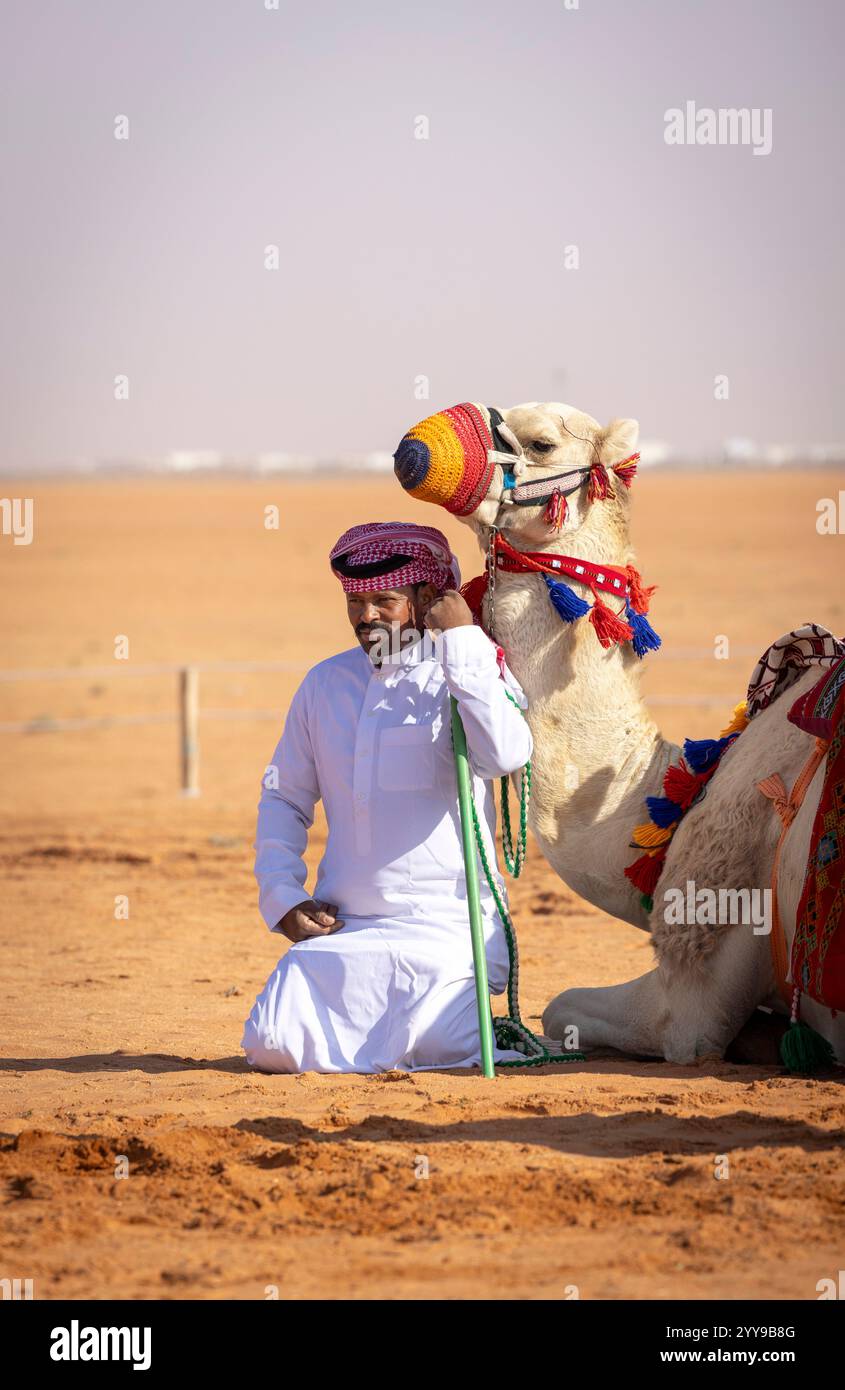 Al-Sayahid, KSA, 14th December 2024: camel rider in traditional ...