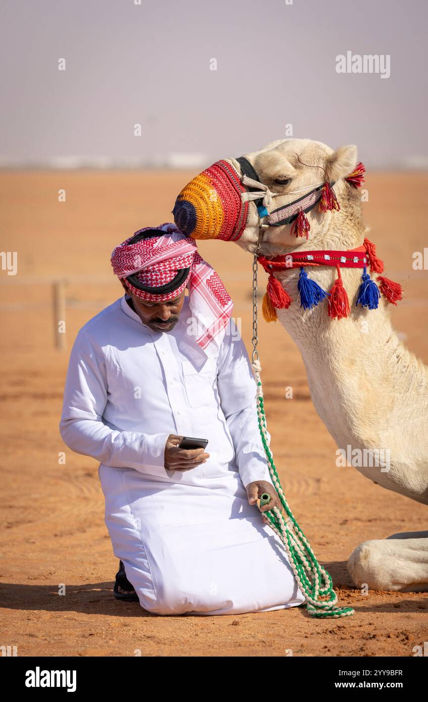 Al-Sayahid, KSA, 14th December 2024: camel rider in traditional ...