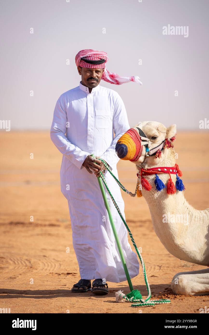 Al-Sayahid, KSA, 14th December 2024: camel rider in traditional ...
