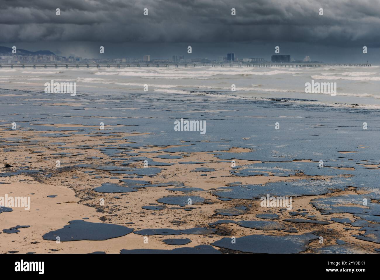 Oil leak in ocean coastline after a tanker wreck. Oil fuel polluted and ...