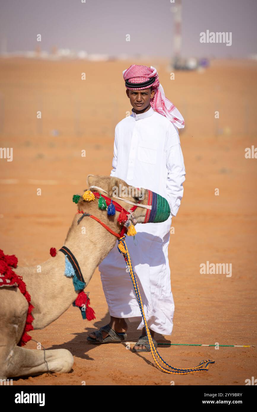 Al-Sayahid, KSA, 14th December 2024: camel rider in traditional ...