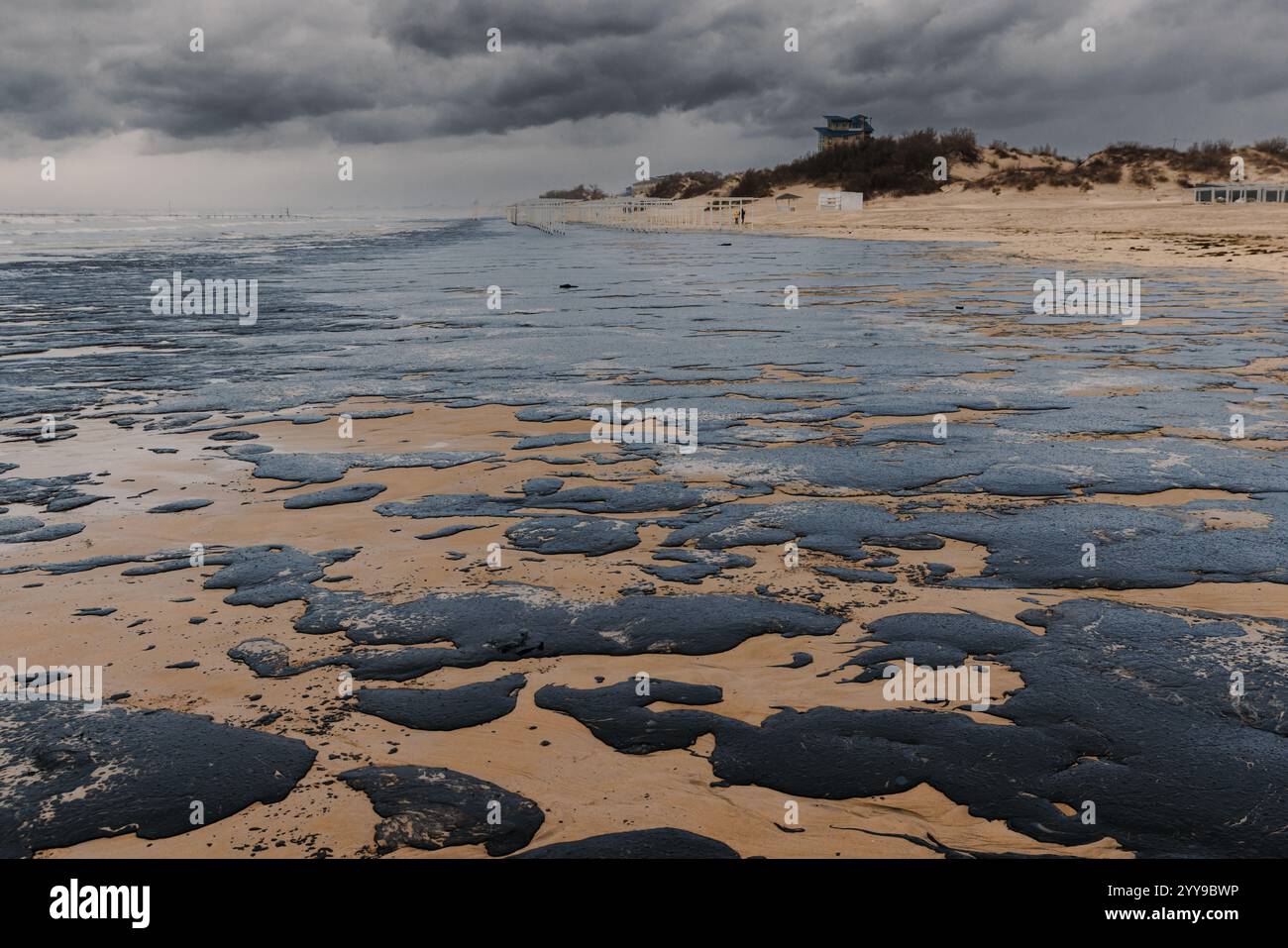 Oil leak in ocean coastline after a tanker wreck. Oil fuel polluted and ...