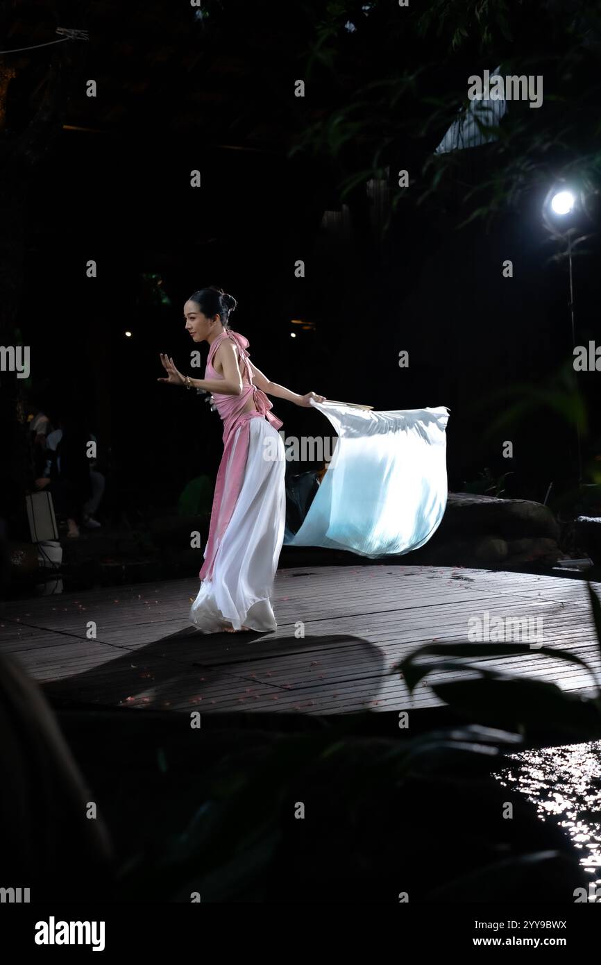 mesmerizing dance performed by a profesional Vietnamese dancer Stock Photo - Alamy