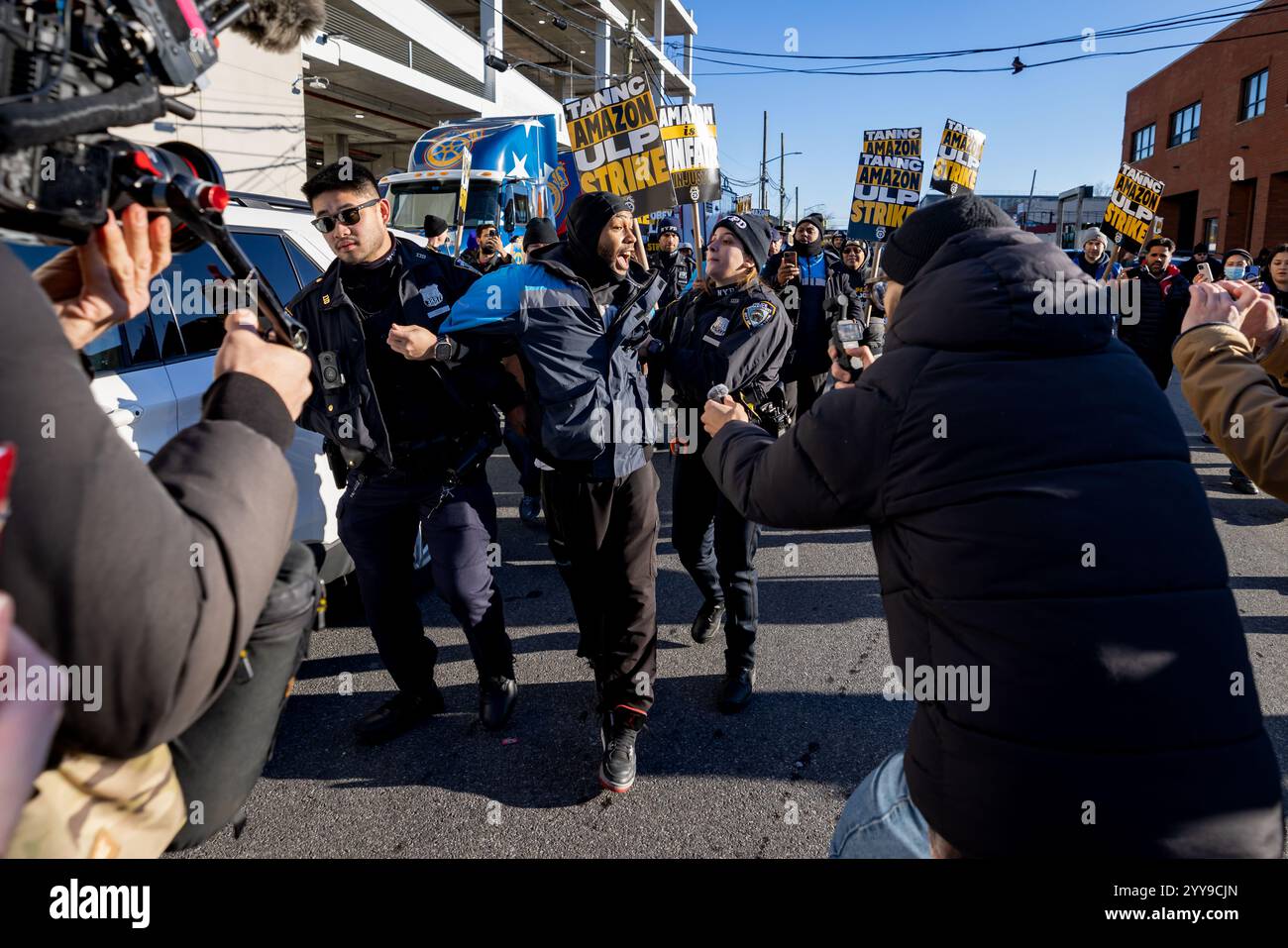 New York, United States. 19th Dec, 2024. An Amazon worker is arrested ...