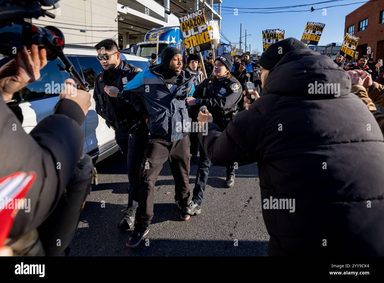 New York, United States. 19th Dec, 2024. An Amazon worker is arrested ...