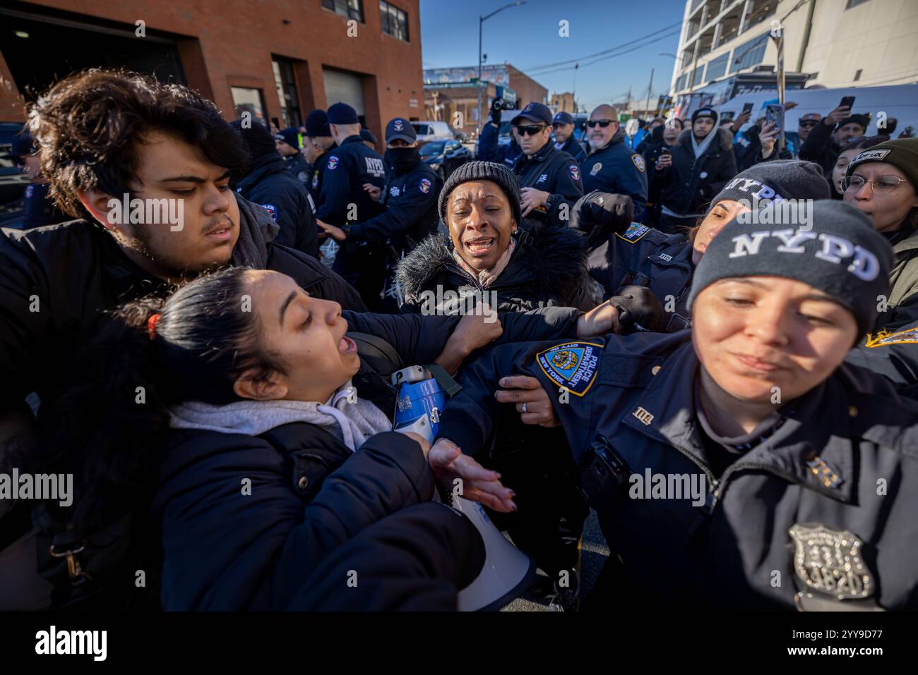 New York, New York, USA. 19th Dec, 2024. NYPD officer Gonzalez (badge ...