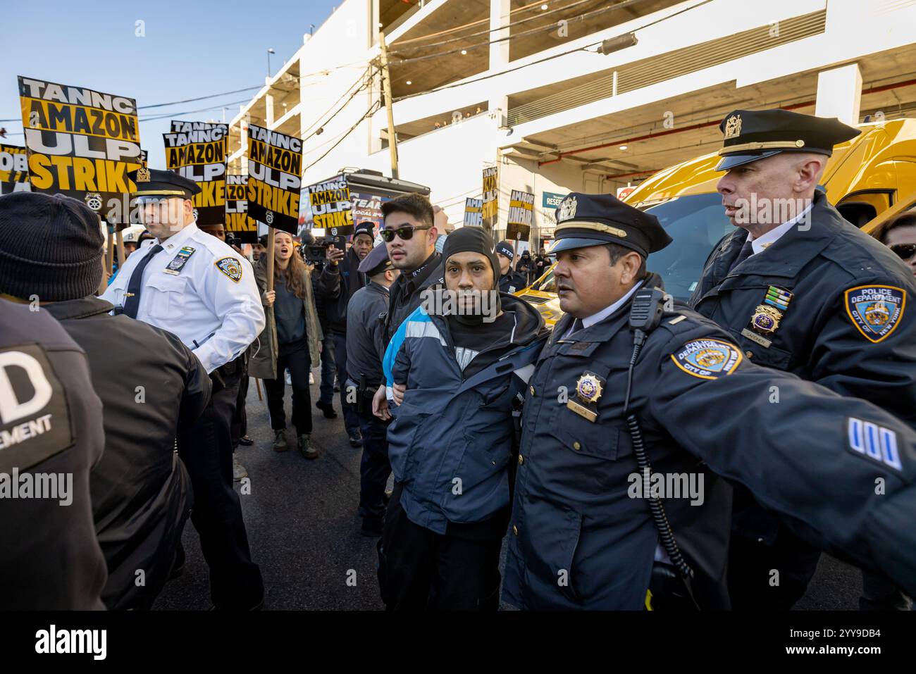 New York, New York, USA. 19th Dec, 2024. An Amazon worker is arrested ...