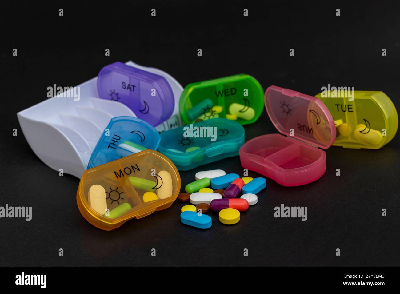 Pill boxes are used to take medication on a daily basis. Pill and pill ...