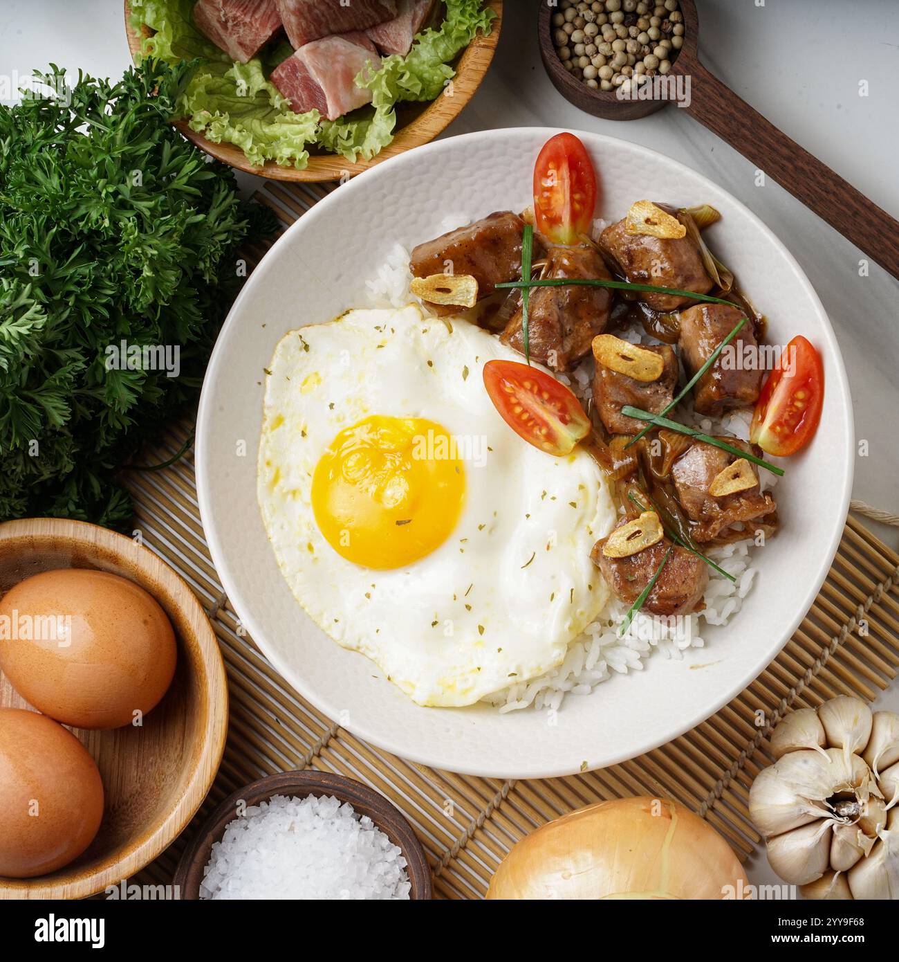Egg topped rice hi-res stock photography and images - Alamy