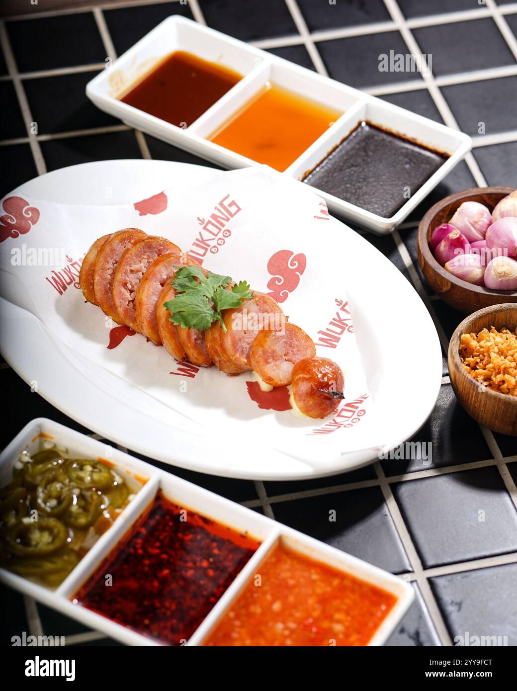 A traditional Asian roasted duck rice dish served with pickled ...