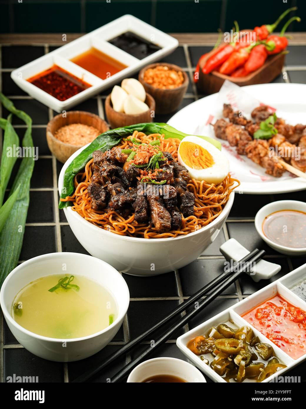 A vibrant bowl of Vietnamese seafood pho, loaded with fresh shrimp ...