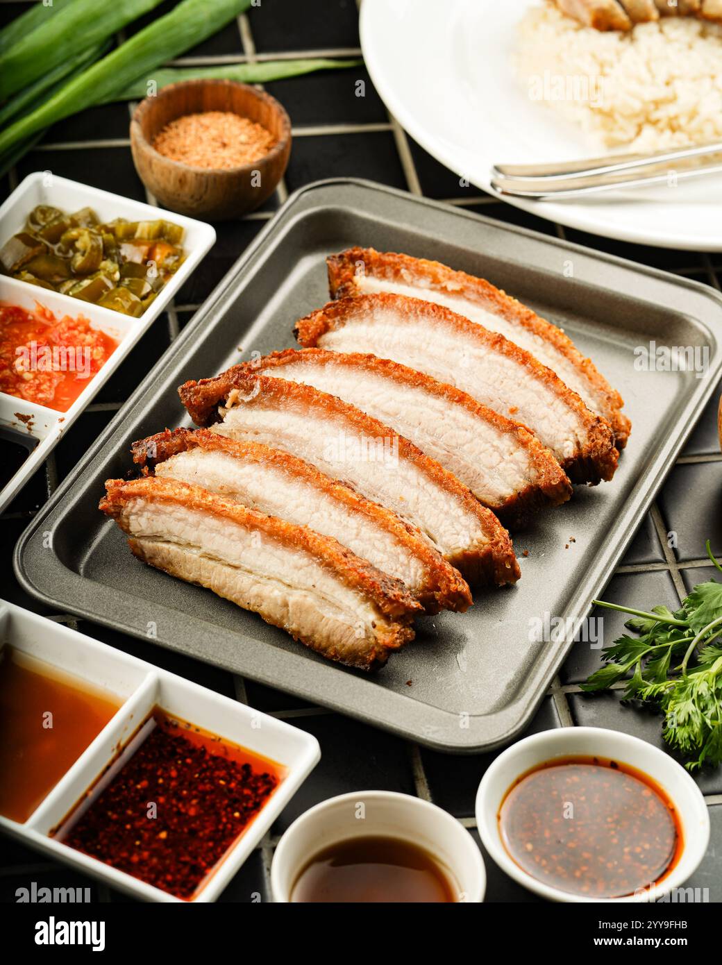 Crispy pork belly (lechon kawali style), perfectly sliced and served on ...