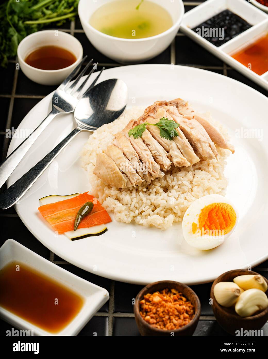 Traditional clay pot rice served with a variety of savory toppings ...