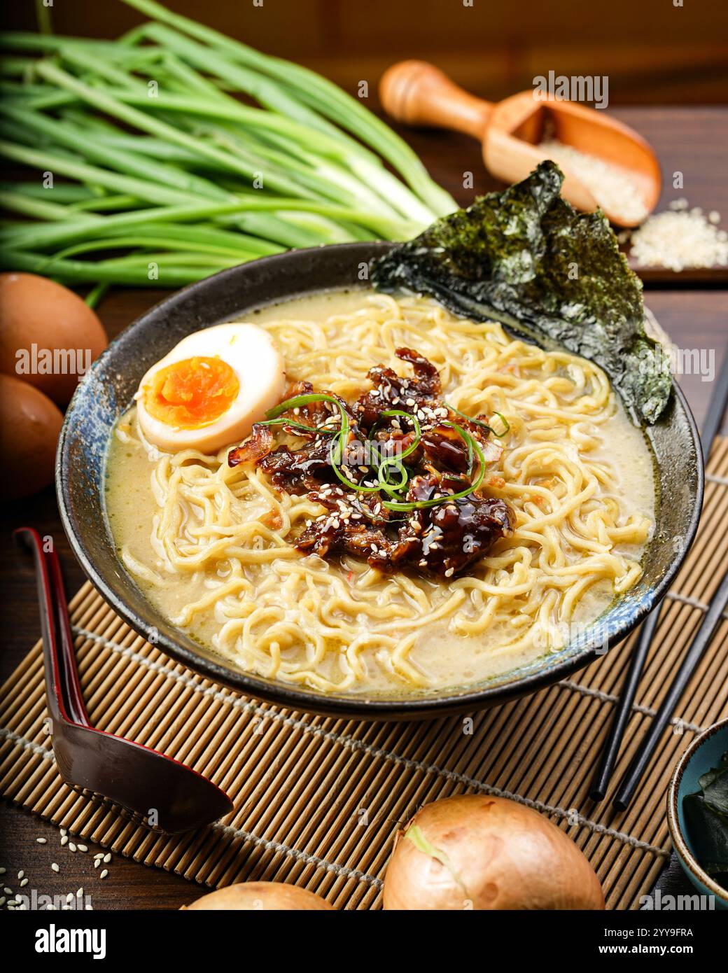 Traditional Japanese ramen served in a rich broth with soft-boiled eggs ...