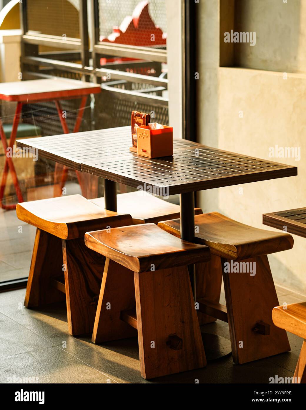 Minimalist restaurant interior wooden stools hi-res stock photography ...