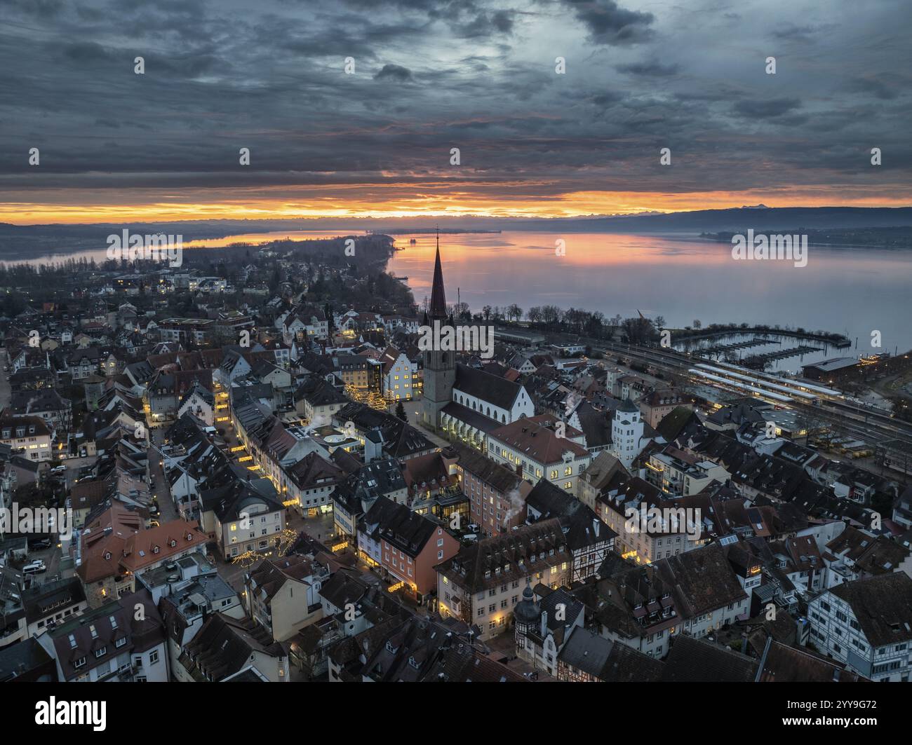 Aerial view of an atmospheric sunrise over the town of Radolfzell on ...