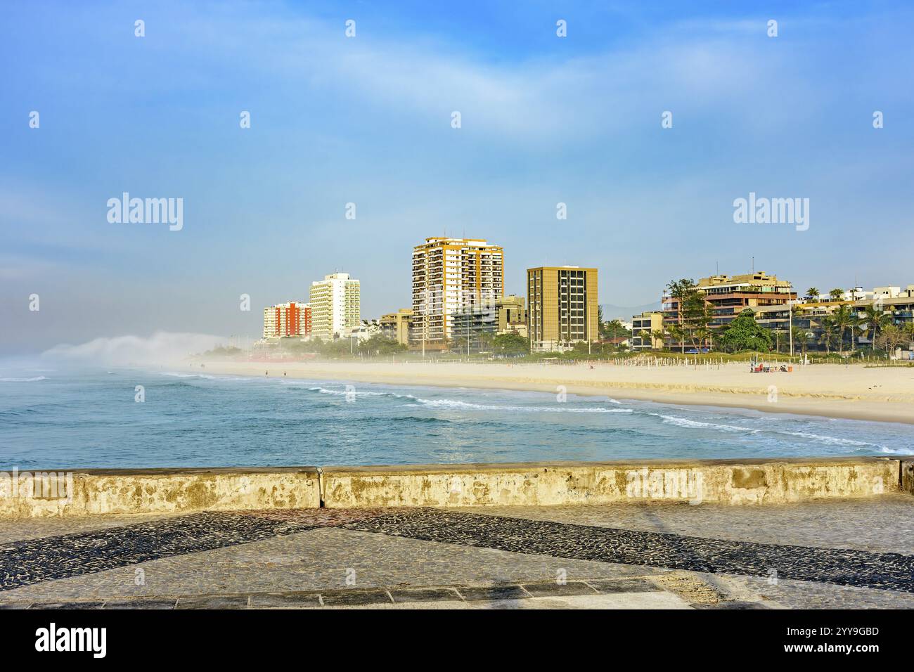 Morning on the breakwater of Barra da Tijuca beach, one of the most ...